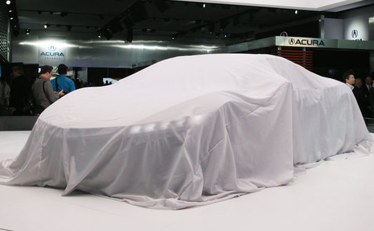 car under drape - Darrow Miller and Friends